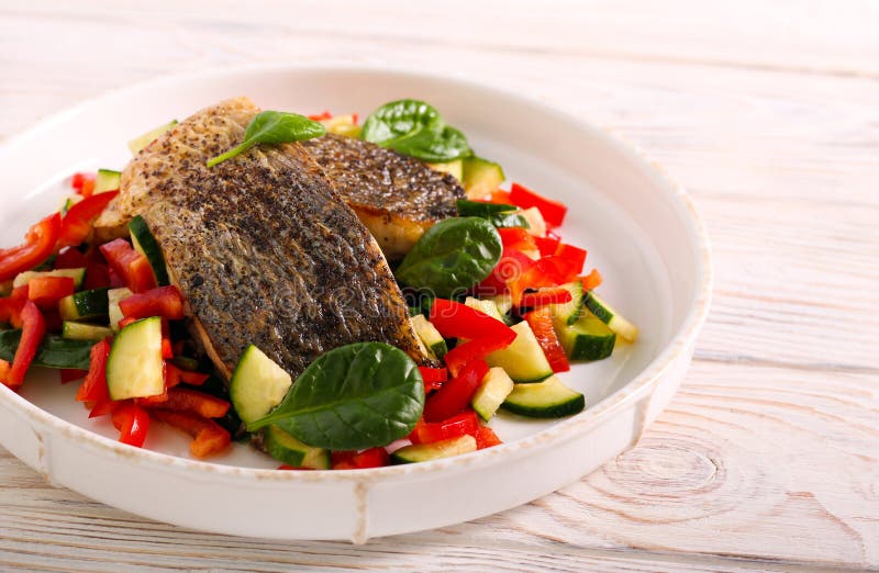 Fried Dorado Fish Fillet and Salad Stock Photo - Image of mahi, fillet ...