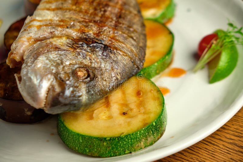 Fried dorado fish stock image. Image of meal, lemon - 246201571