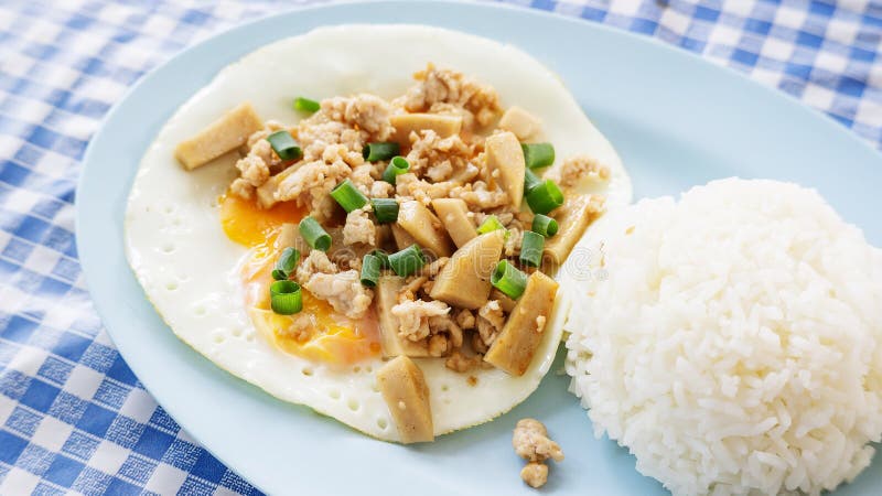 Fried egg with cooked rice stock image. Image of food - 186345915