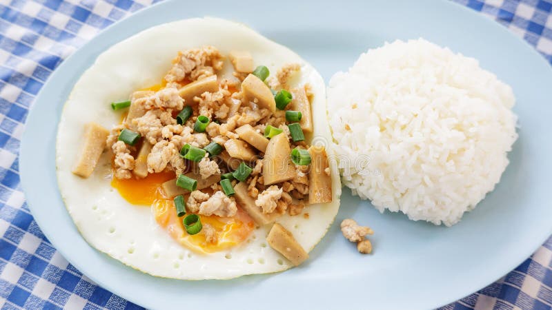 Fried egg with cooked rice stock image. Image of asian - 186500121