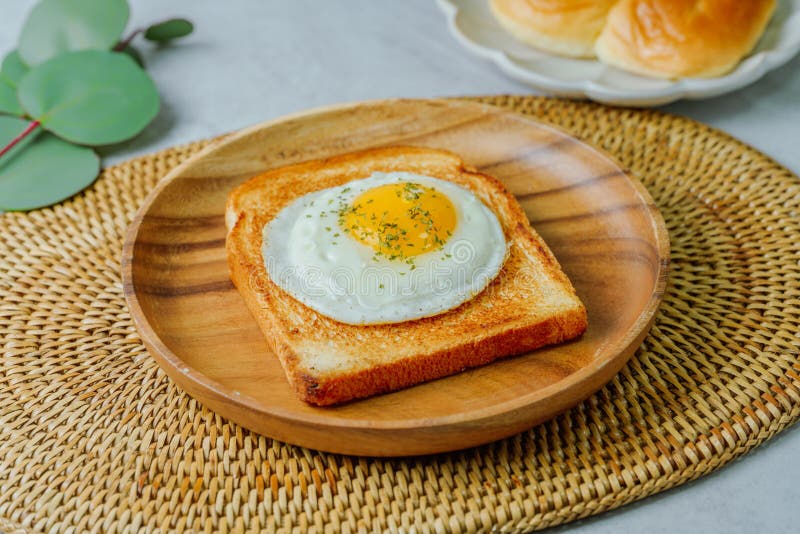 Fried Egg Crispy Toast Food with Pasley on Wood Plate Stock Photo ...