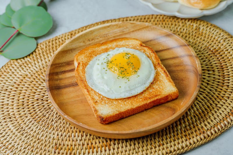 Fried Egg Crispy Toast Food with Pasley on Wood Plate Stock Photo ...