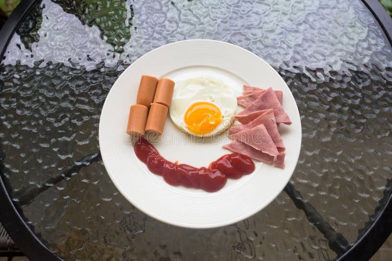 Fried Egg Hot Dog Ham and Ketchup in Plate Stock Image - Image of ...