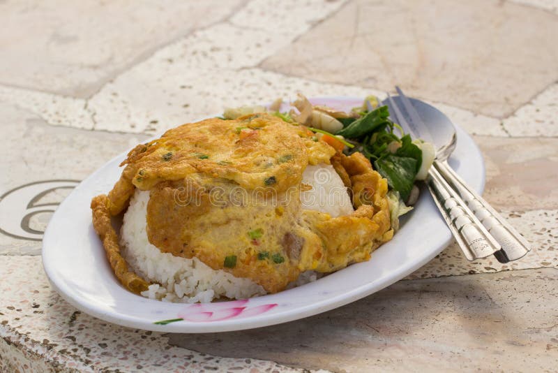 Fried Egg with Rice on Plate Stock Photo - Image of fork, eating: 34712980