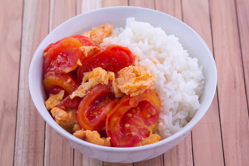 Fried Egg with Tomato with Rice Stock Image - Image of backdrop, onion ...