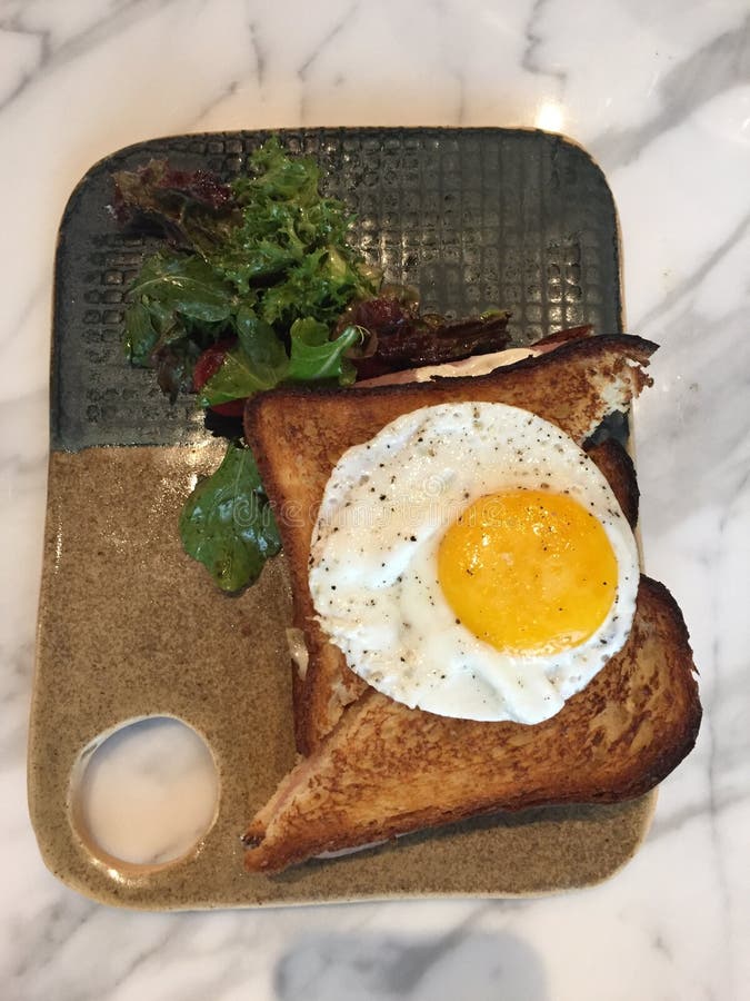 Fried Egg on Toast on a Platter Stock Photo - Image of food, green ...