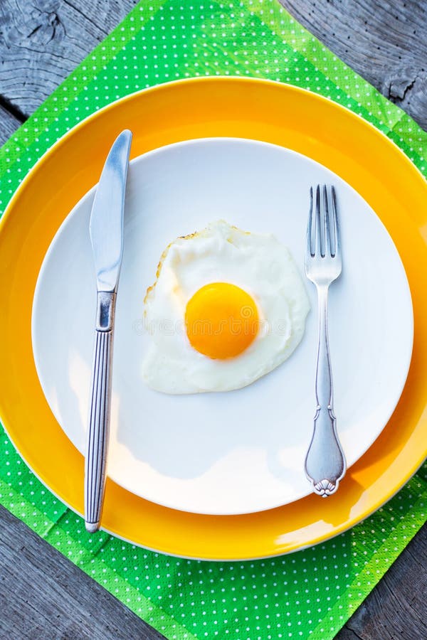 Fried Egg on a White, Yellow Plate. Restaurant. Breakfast Stock Image ...