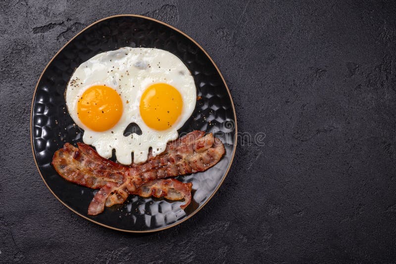 Fried Eggs with Bacon in the Shape of a Skull Stock Image - Image of ...