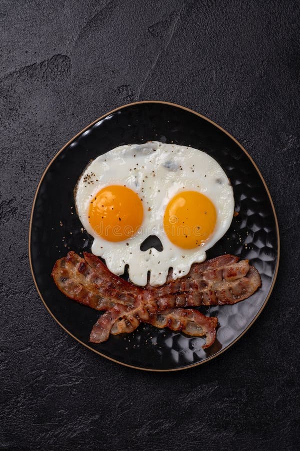 Fried Eggs with Bacon in the Shape of a Skull Stock Image - Image of ...