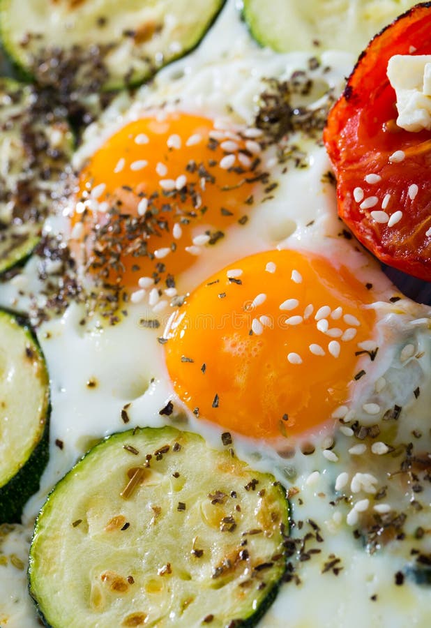 Fried Eggs with Courgettes, Tomatoes Stock Photo - Image of appetizer ...