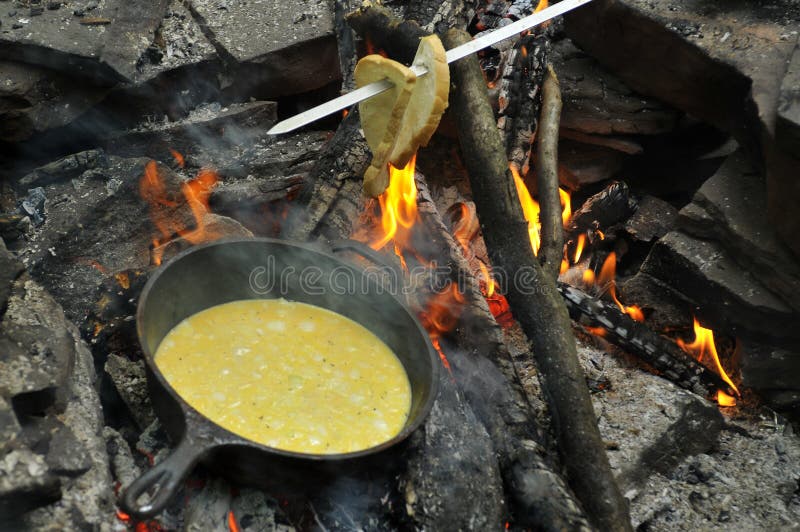 Fried Eggs on Fire at Iron Fried Pan Stock Image - Image of omelette ...