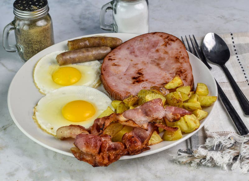 Fried Eggs with Ham, Bacon and Sausage Stock Photo - Image of home ...