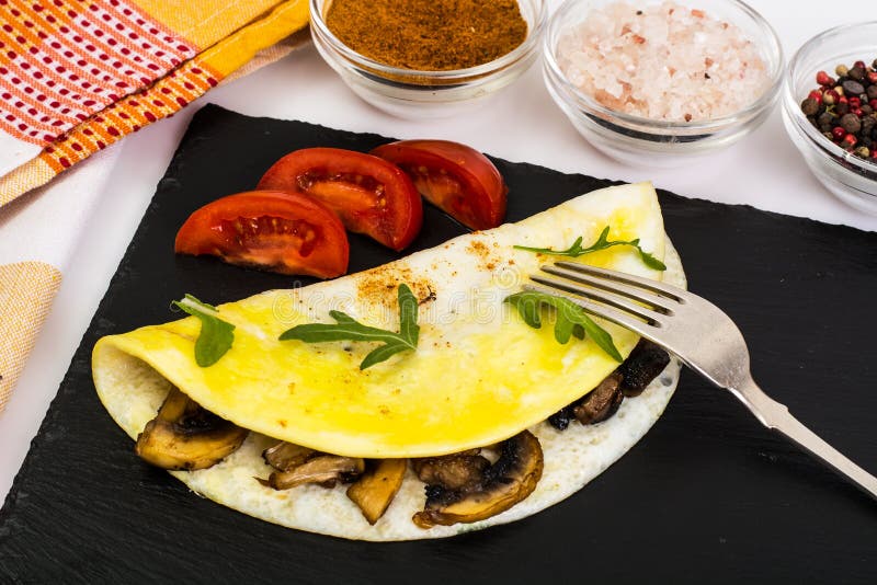 Fried Eggs with Mushrooms on Black Stone Stock Photo - Image of fried ...