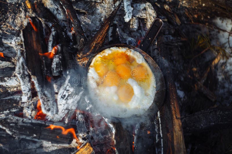 Fried Eggs on the Pan on the Fire in Winter Stock Image - Image of ...