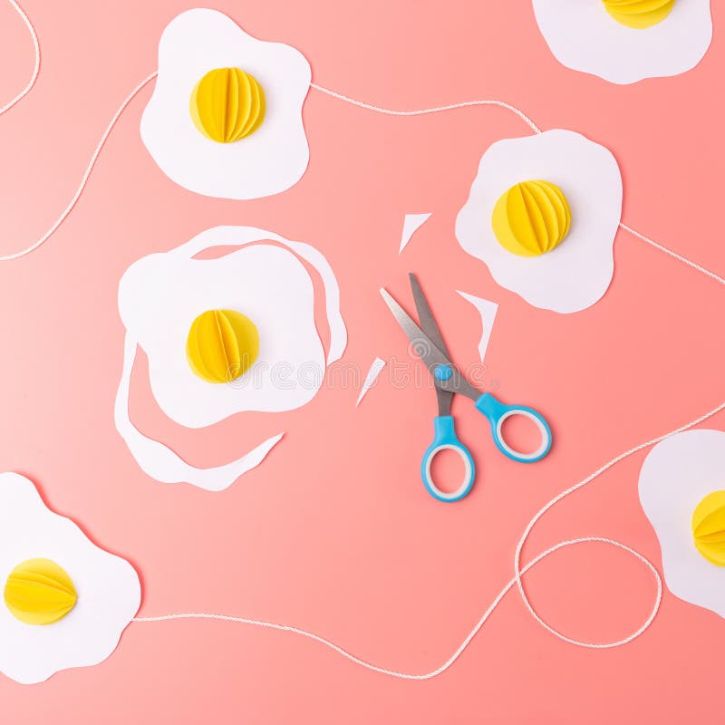 Fried Eggs Paper Craft Hanging from a String on a Pink Background ...