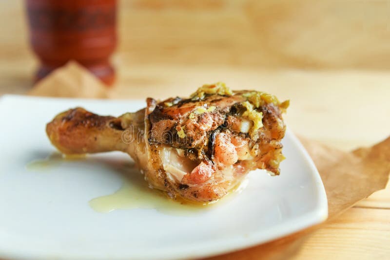 Fried fat chicken leg stock photo. Image of dinner, wood - 181406832