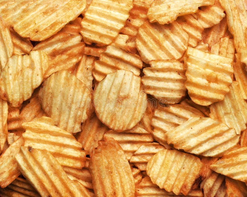 Fried fatty potato crisps stock image. Image of crispy - 147712079