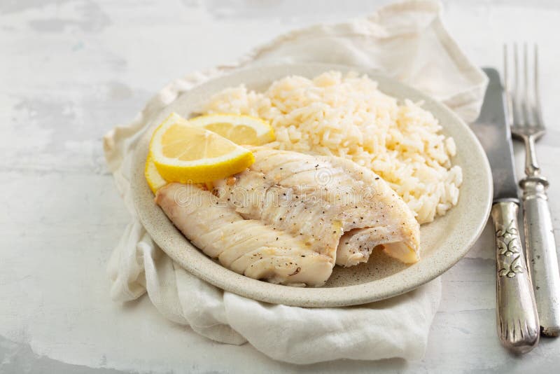 Fried Fish with Boiled White Rice on White Dish Stock Photo - Image of ...