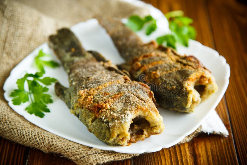 Fried fish in breading stock photo. Image of lunch, breading - 99350370