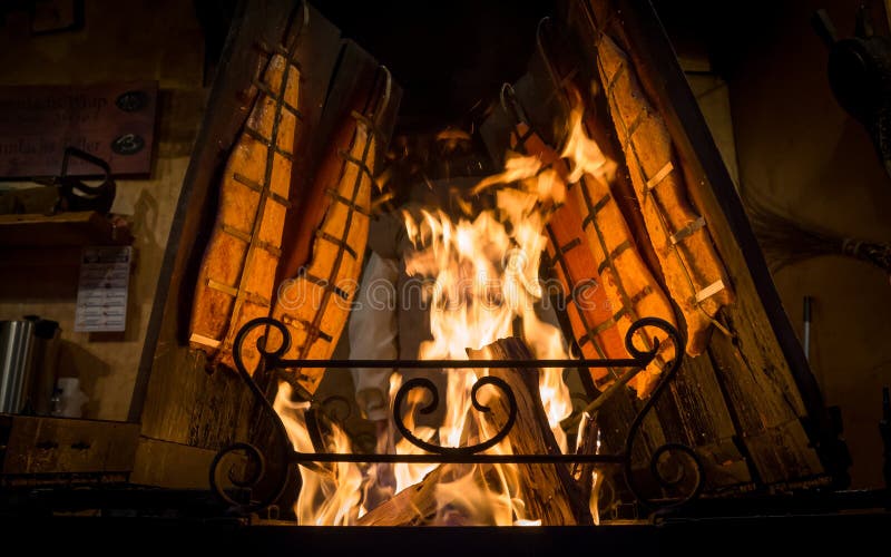 Fried fish on burning fire stock image. Image of fire - 106825525