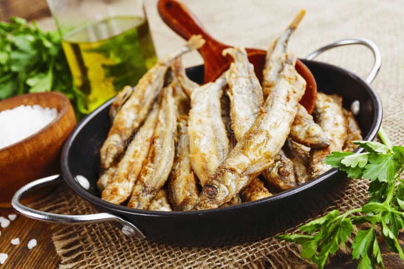Fried fish capelin stock image. Image of second, fish - 65579685