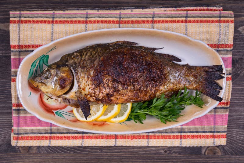 Fried Fish Carp on the Plate Stock Image - Image of cuisine, food: 72554625