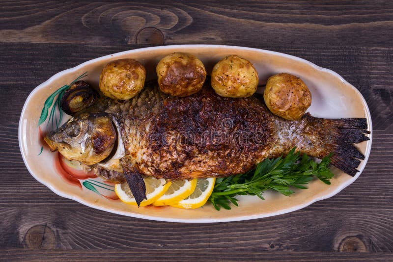 Fried Fish Carp on the Plate Stock Image - Image of fried, carp: 73327907