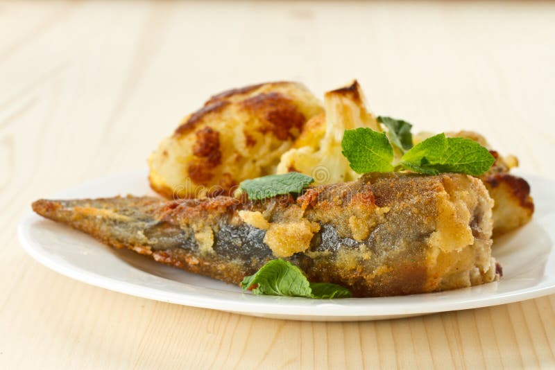 Fried Fish with Cauliflower Stock Image - Image of delicious, cooked ...