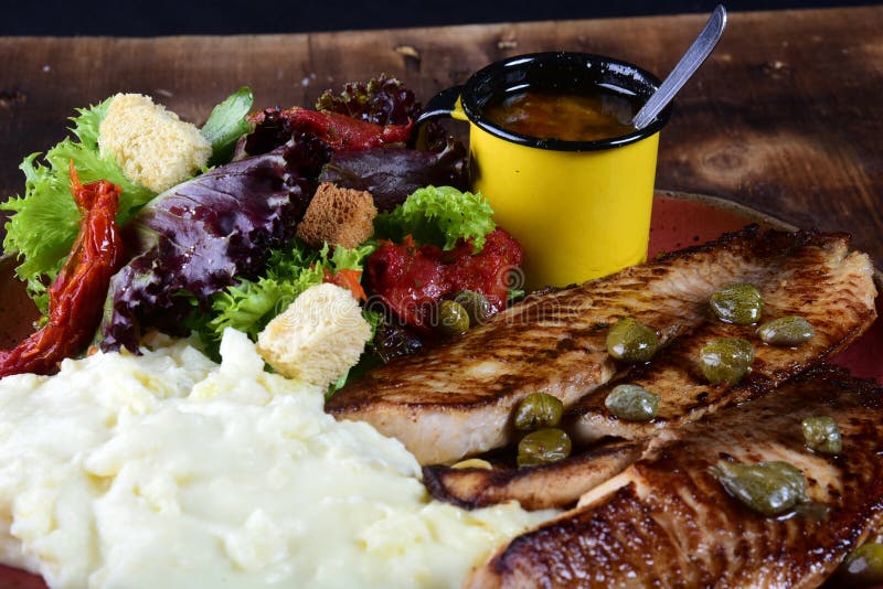 Fried Fish Fillet with Boiled Mashed Potatoes and Salads Stock Image ...
