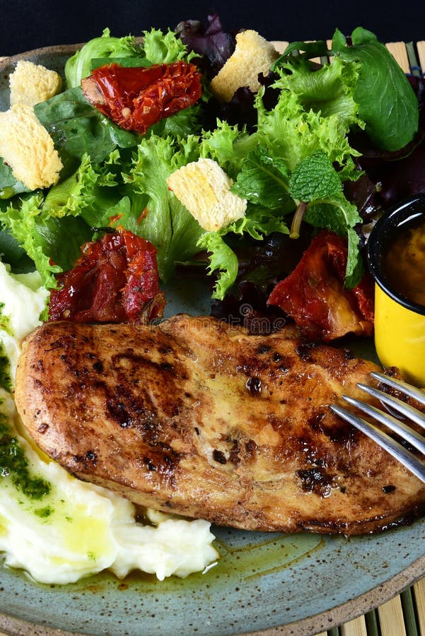 Fried Fish Fillet with Boiled Mashed Potatoes and Salads Stock Photo ...