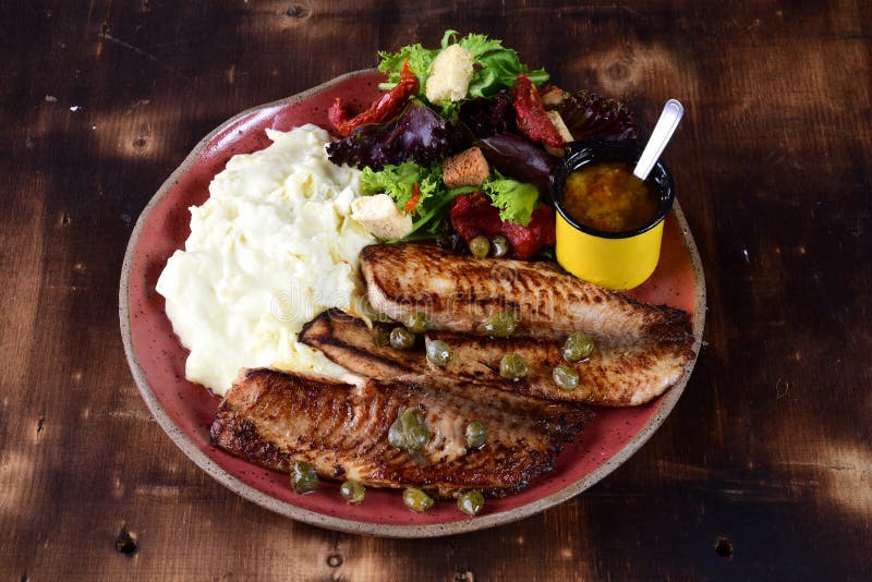 Fried Fish Fillet with Boiled Mashed Potatoes and Salads Stock Image ...