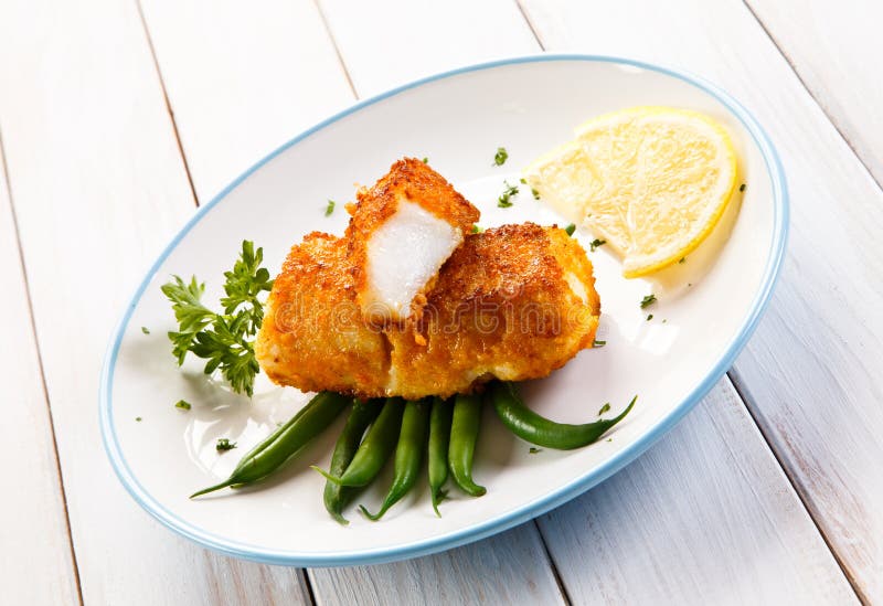 Fried fish fillet stock image. Image of garnish, delicious - 74715031
