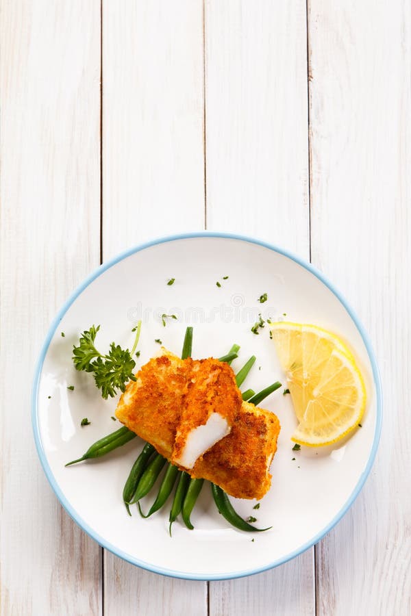 Fried fish fillet stock photo. Image of lemon, meal, dine - 74715096