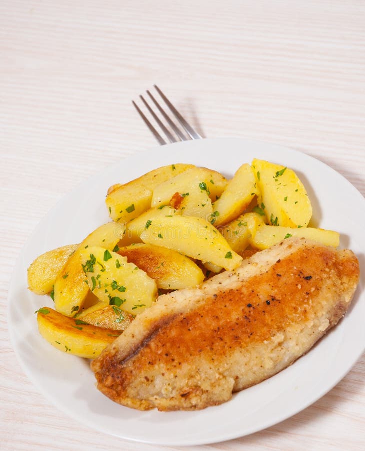 Fried Fish Fillet and Potatoes Stock Photo - Image of kitchen, frying ...