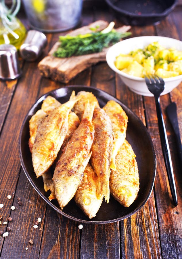 Fried Fish in Flour and Oil Stock Photo - Image of lemon, kingdom ...