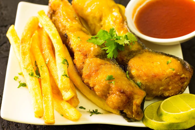 Fried Fish and French Fries are Placed on the Table Stock Image - Image ...