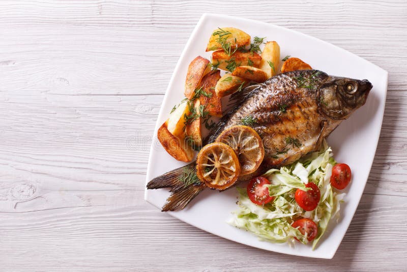 Fried Fish with Fries and Salad Horizontal Top View Stock Photo - Image ...