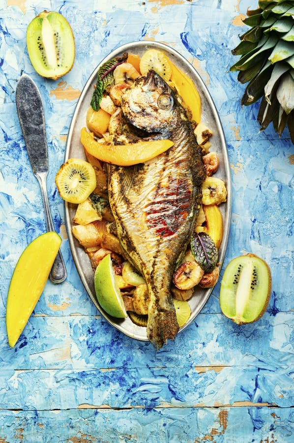 Fried fish in fruit stock image. Image of view, fruit - 267644597
