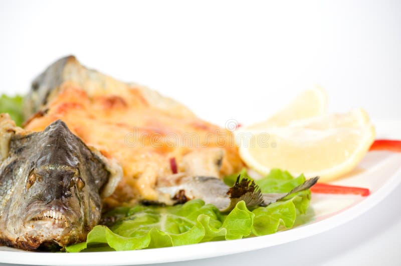 Fried Fish Garnished on Sliced Olive Stock Image - Image of fish, slice ...
