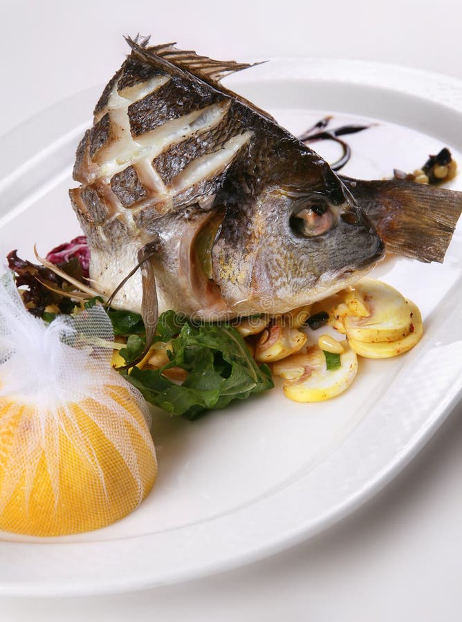 Fried fish with lemon stock image. Image of food, mushroom - 7008625