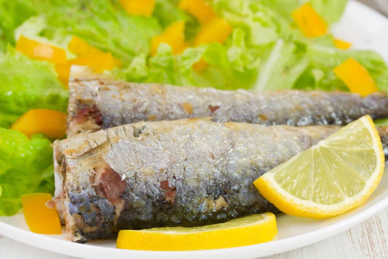 Fried fish with lemon stock image. Image of olive, napkin - 29734771