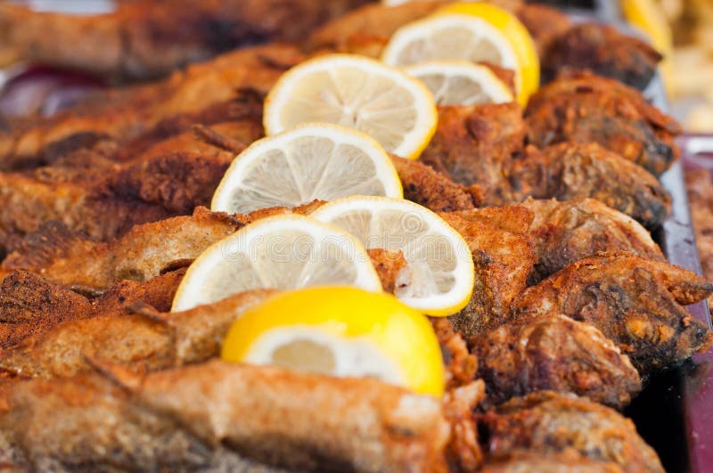 Fried Fish with Lemon Slice Stock Photo - Image of baked, fried: 45970106