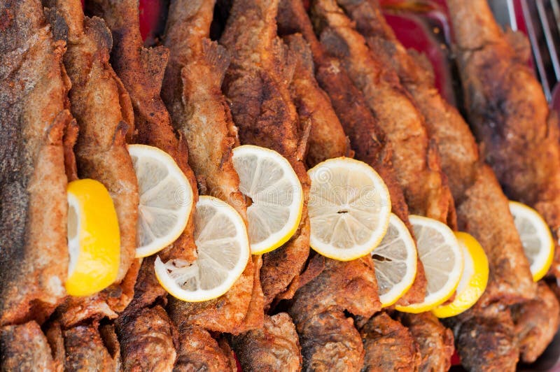 Fried Fish with Lemon Slice Stock Image - Image of lemon, grill: 44935039