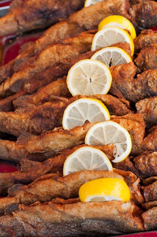 Fried Fish with Lemon Slice Stock Photo - Image of baked, fried: 45970106