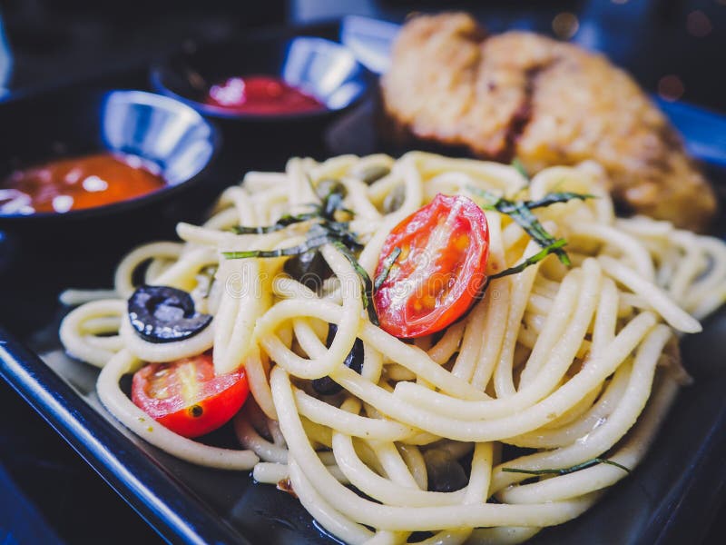 Spaghetti with Fried Fish stock image. Image of sauce - 122773751