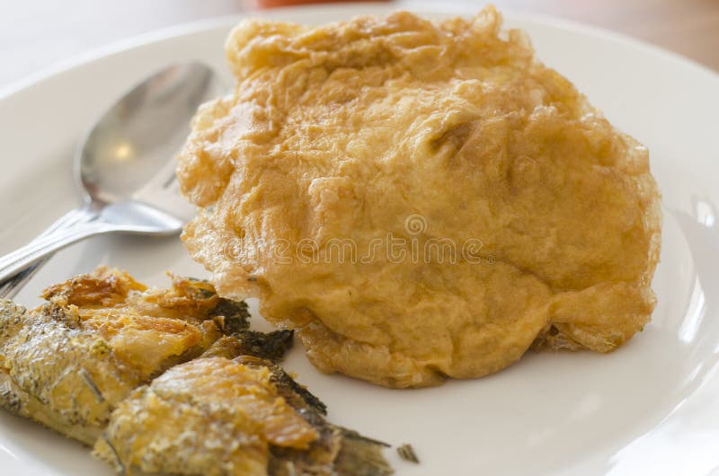 Fried Fish and Omelet in Dish Stock Image - Image of culture, cook ...