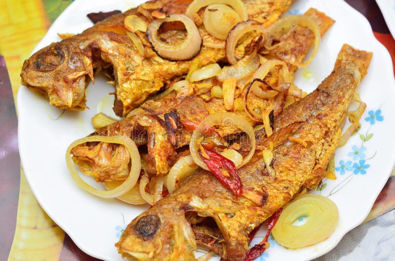 Fried Fish With Green Salad, Onions And Lemon Stock Photo - Image of ...