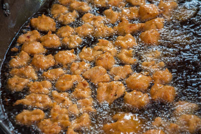 Fried Fish Patty is Fried in Boiling Oil. Stock Photo - Image of fresh ...