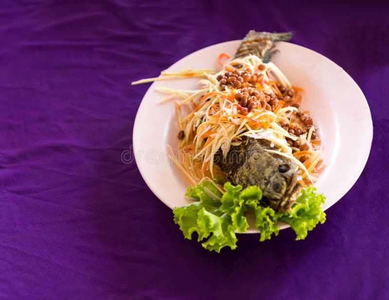 Fried fish with peanuts. stock photo. Image of cloth - 93769948