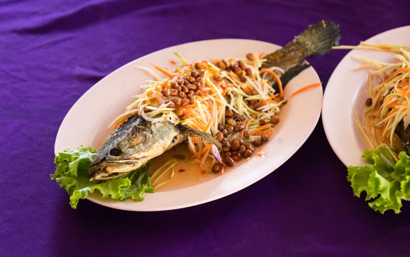 Fried fish with peanuts. stock photo. Image of dish, nutrition - 93769970